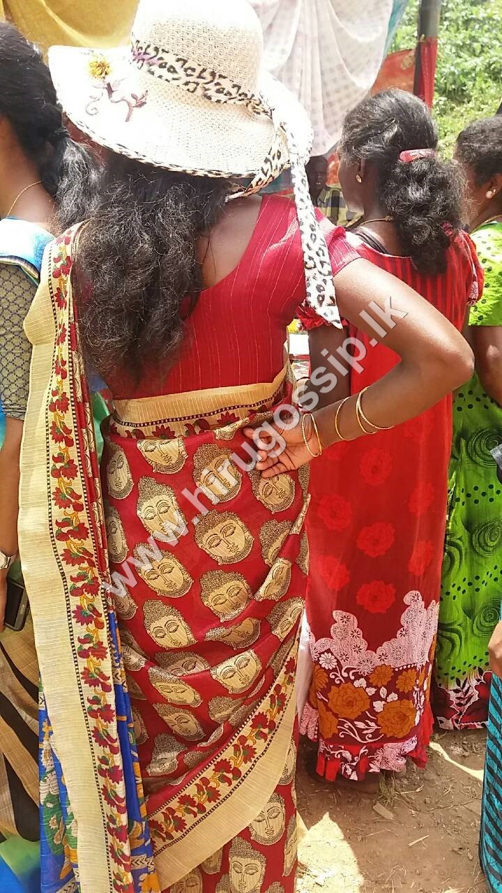 අවුරුදු උත්සවයට බුදු රුව සහිත සාරියක් ඇඳන් ආපු කාන්තාවකට වෙච්ච දේ ...